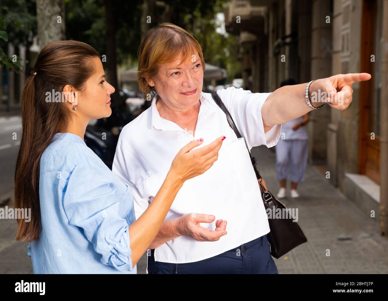 Helping people find their way hi-res stock photography and images - Alamy