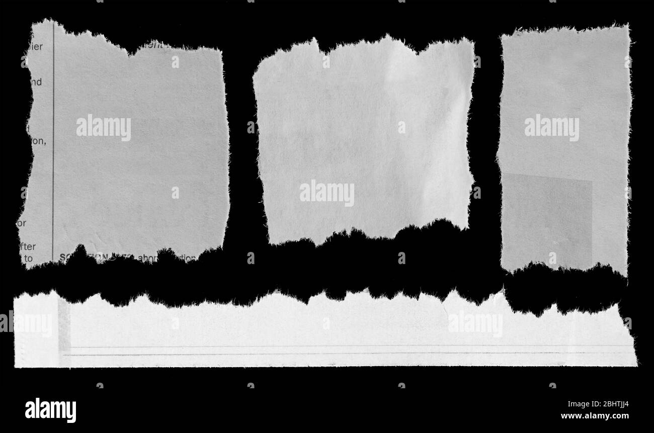 Four pieces of torn newspaper on black background Stock Photo - Alamy