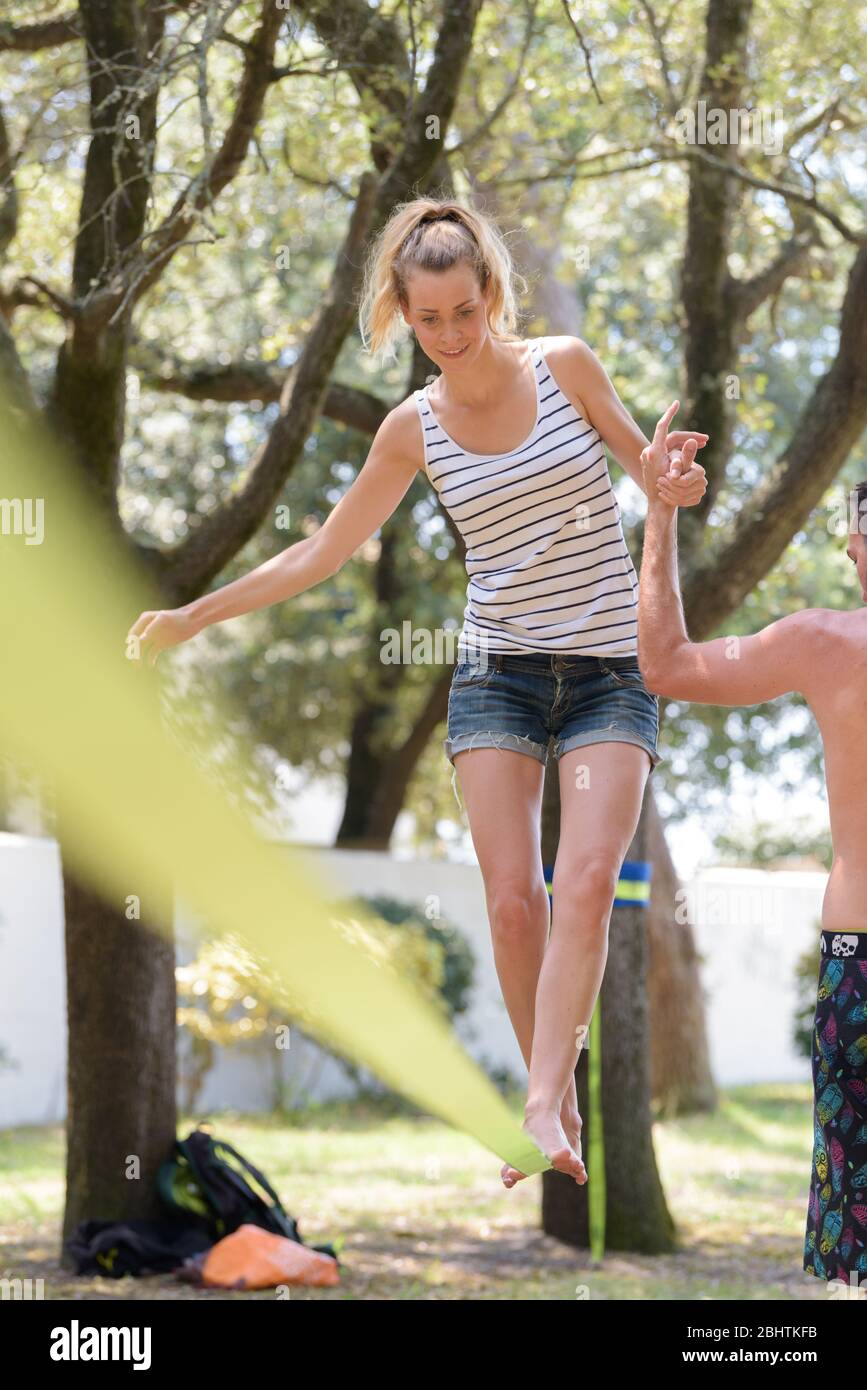 Slack line and female hi-res stock photography and images - Alamy