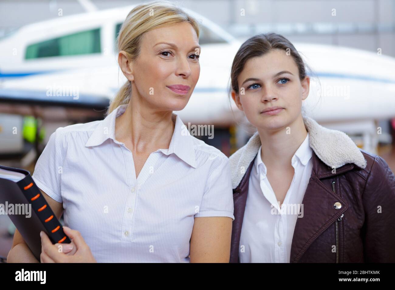 Young female pilot hi-res stock photography and images - Alamy