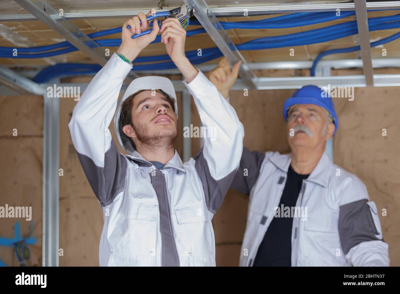 Electrician working inside house hi-res stock photography and images ...