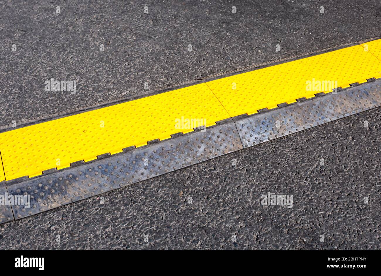 Artificial unevenness to reduce speed on the road. Sleeping policeman ...