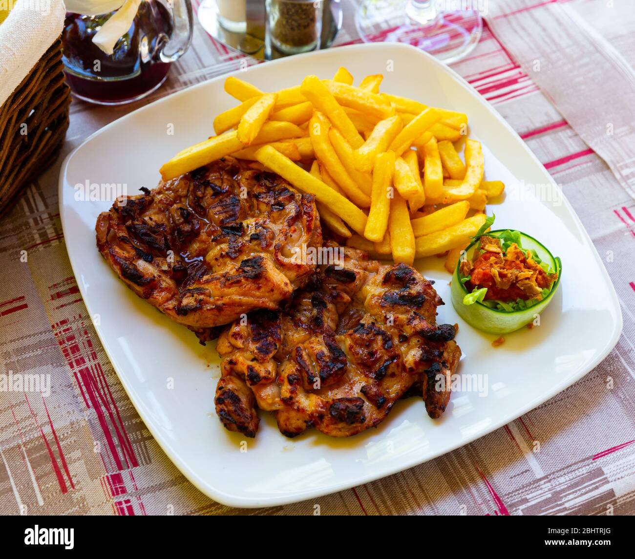 Traditional Balkan dish Pileci Batak - fillets of chicken thighs grill ...