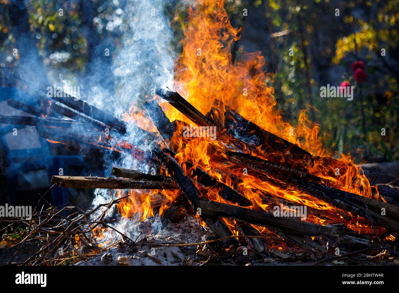 Big bonfire made of boards. Beautiful fire Stock Photo - Alamy