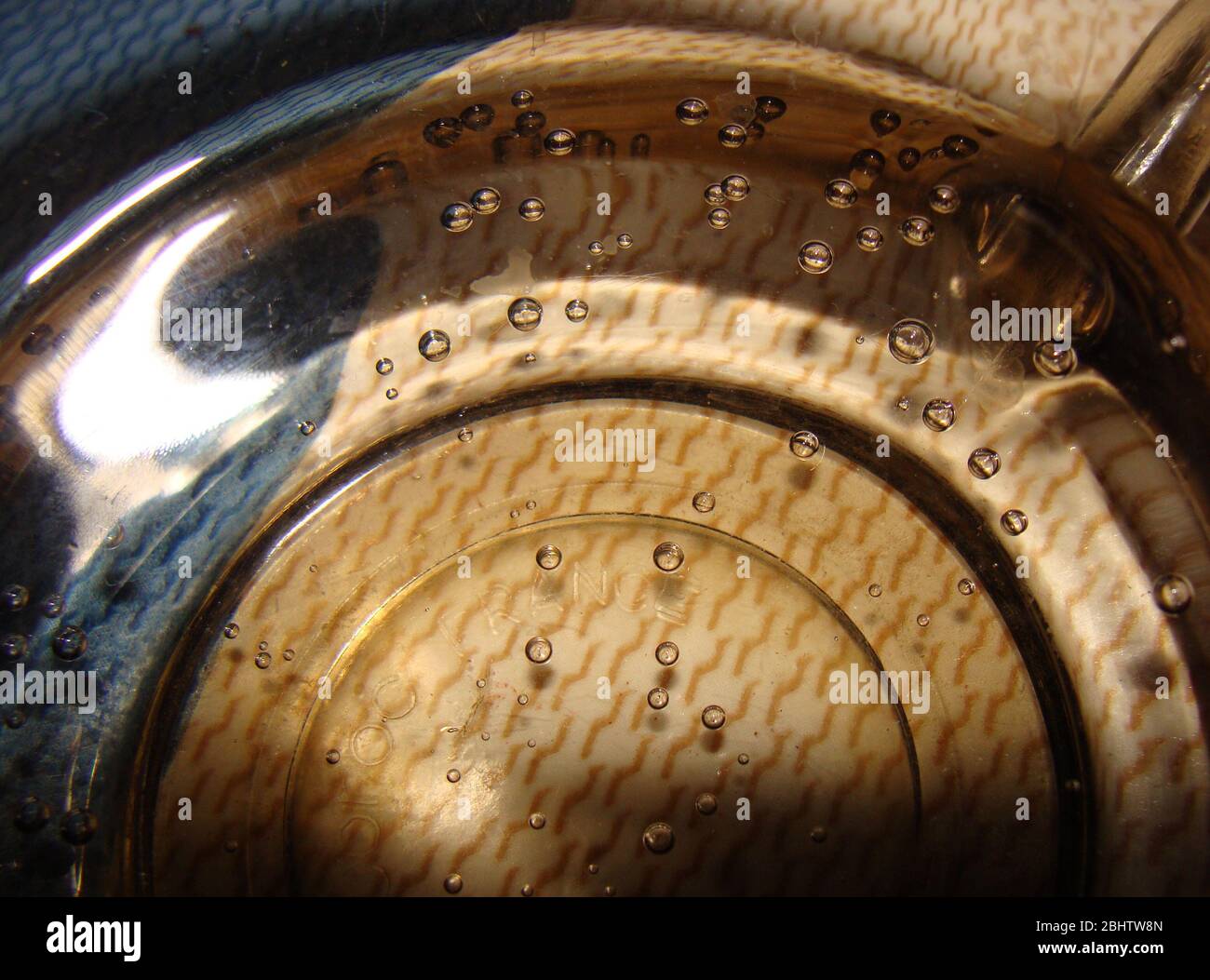 Sparkling water in a cup. Bulbs, top view. Background Stock Photo - Alamy