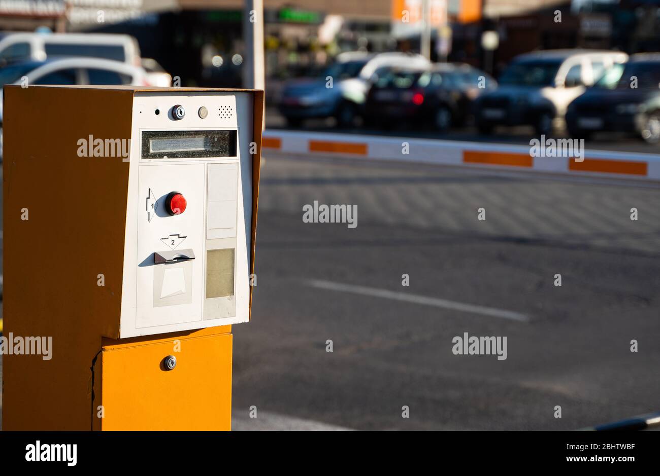 Parking tickets machine on a entree in parking area Stock Photo - Alamy