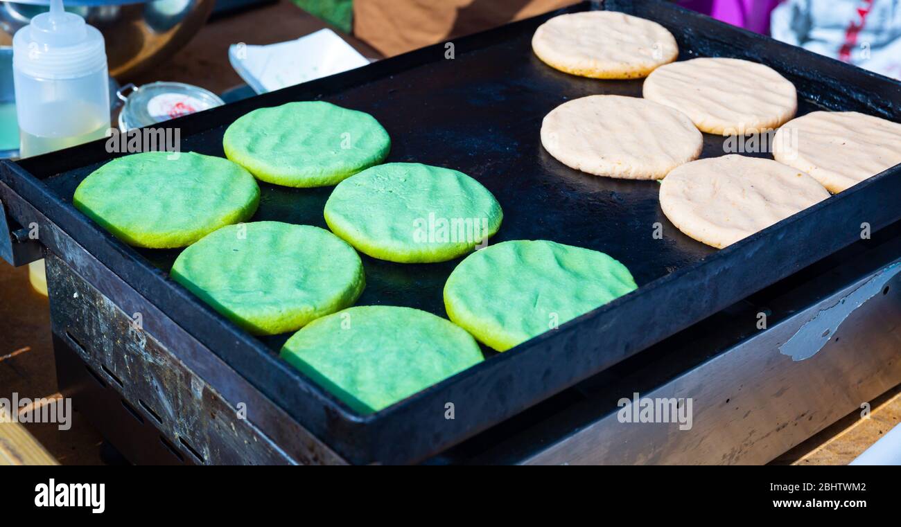 Arepas from corn meal, Venezuelan traditional fast street food, nobody ...