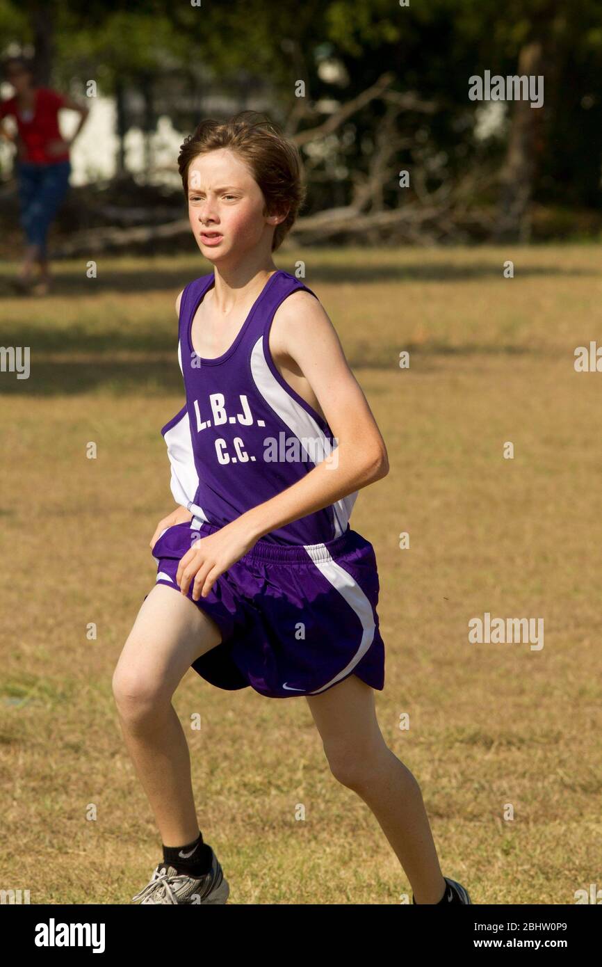 Teen boy running track hi-res stock photography and images - Alamy