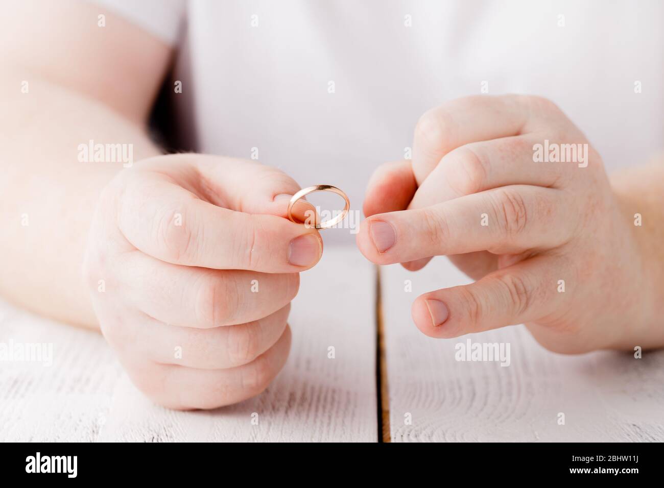 Wedding ring finger take off hi-res stock photography and images - Alamy