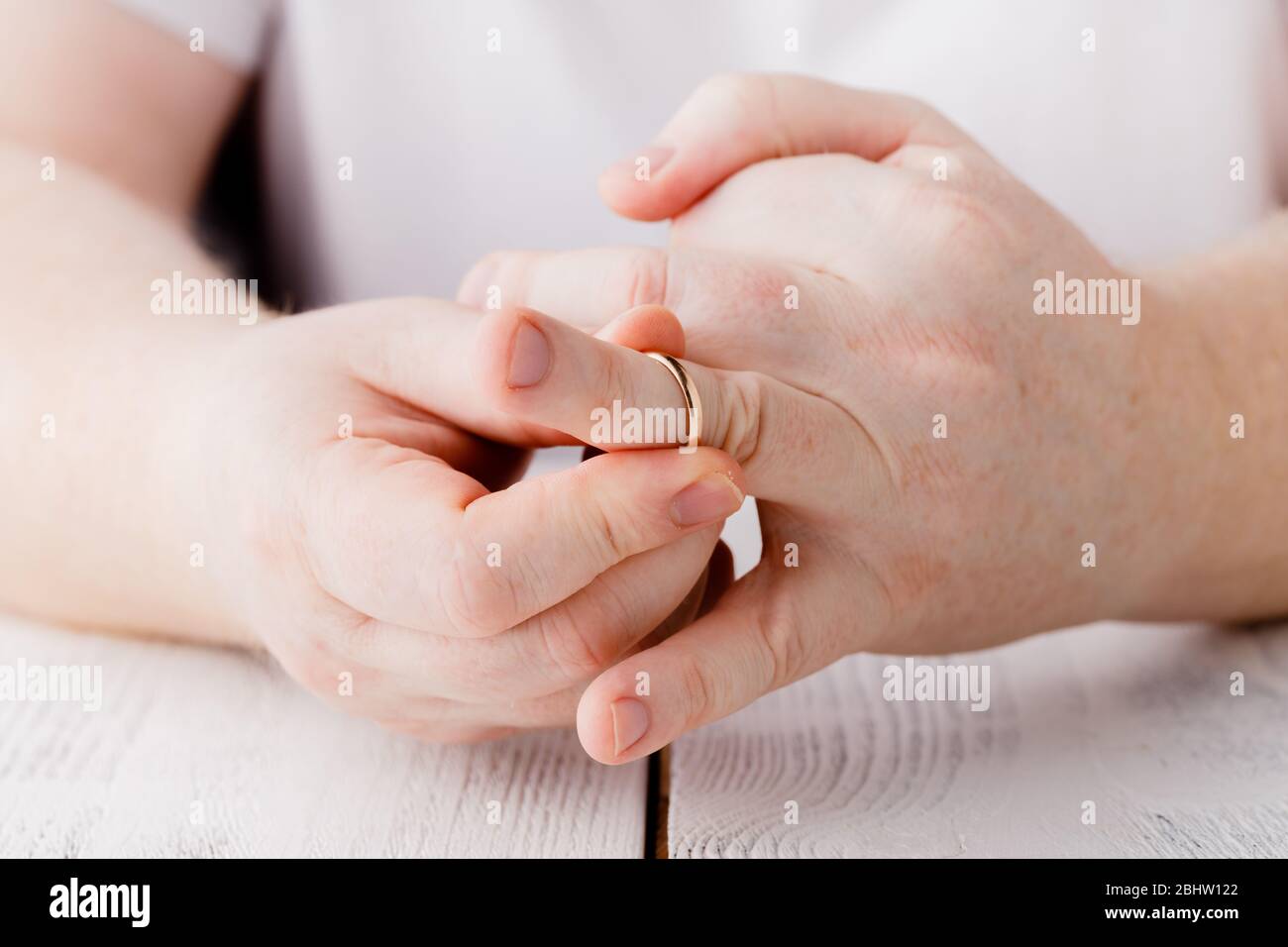 Wedding ring finger take off hi-res stock photography and images - Alamy