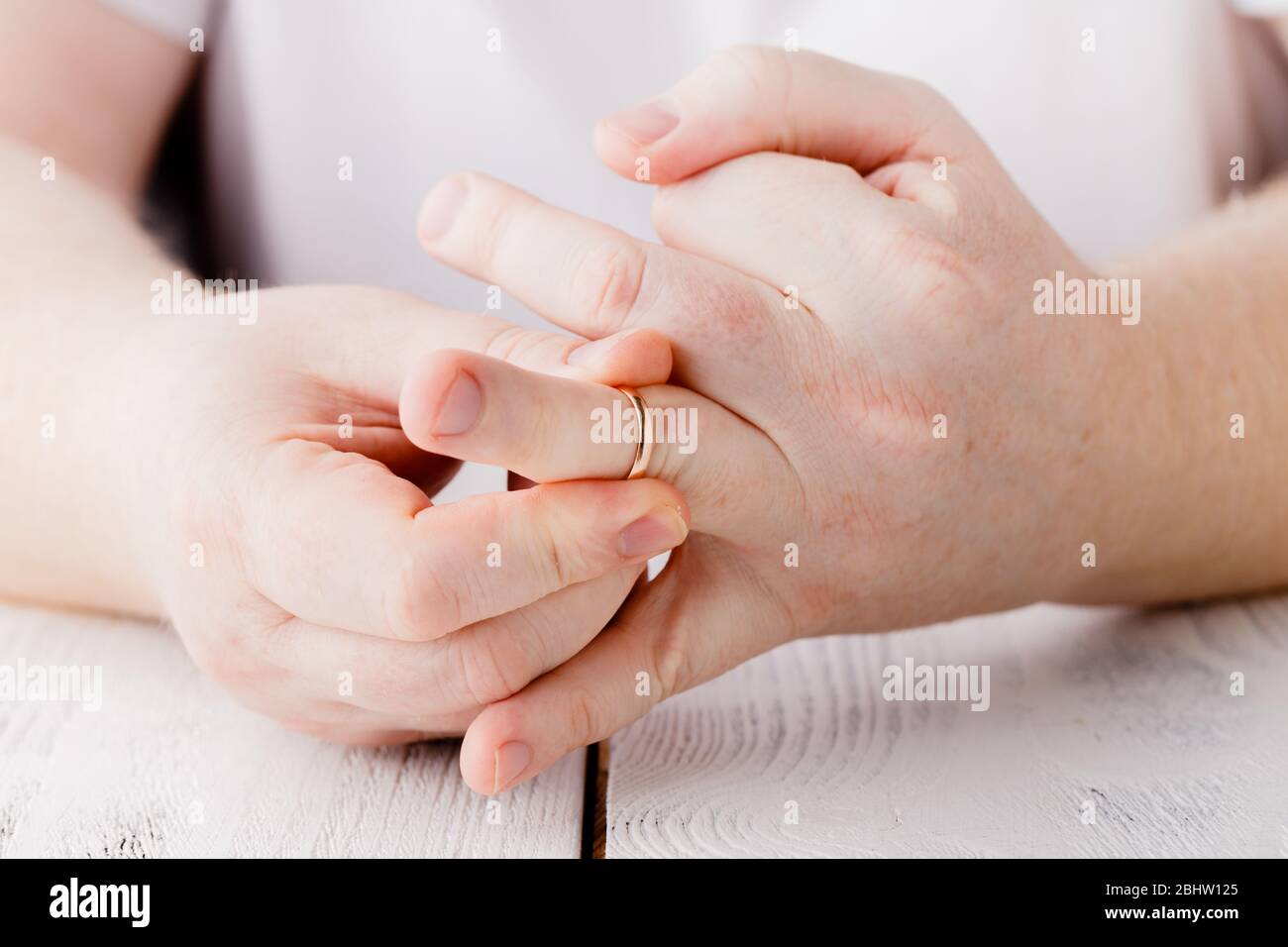 Wedding ring finger take off hi-res stock photography and images - Alamy