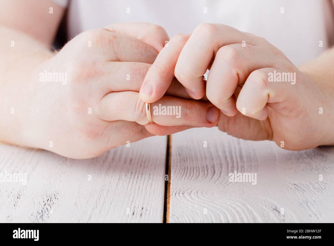Wedding ring finger take off hi-res stock photography and images - Alamy
