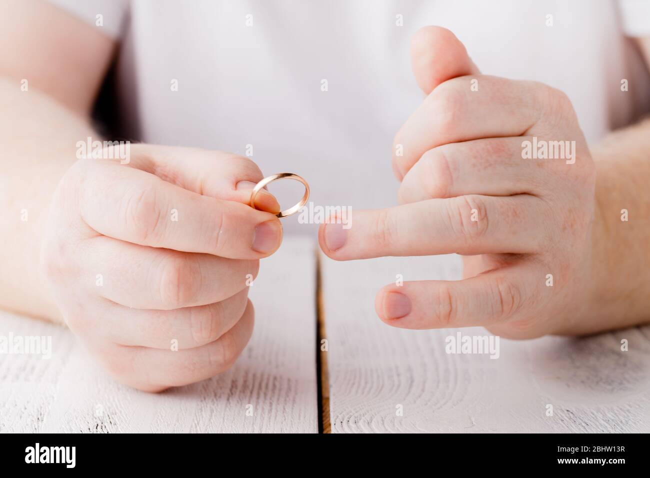 Wedding ring finger take off hi-res stock photography and images - Alamy