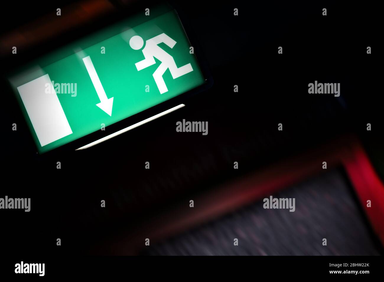 Fire and emergency sign symbol with building rescue evacuation door way ...