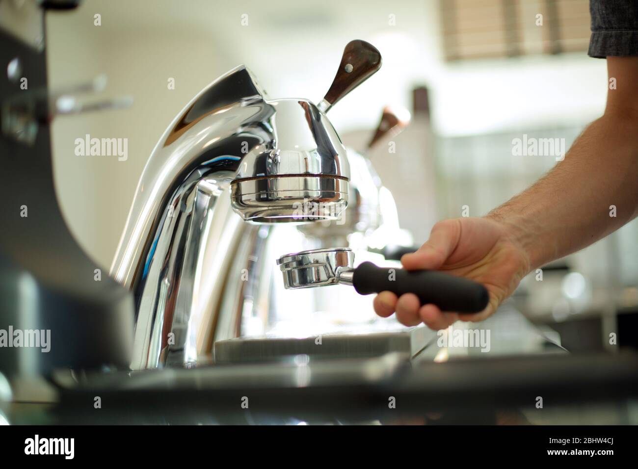 Making professional espresso coffee drinks Stock Photo - Alamy