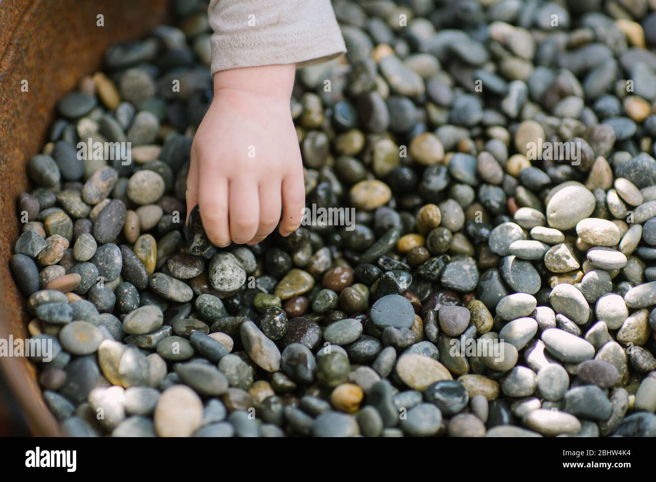 Picking up rocks hi-res stock photography and images - Alamy