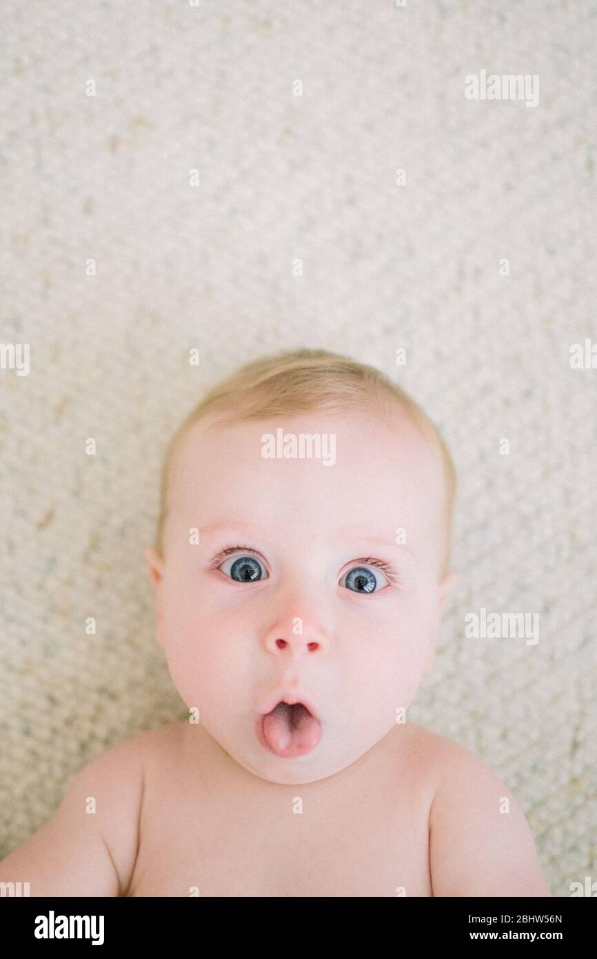 Infant girl making face hi-res stock photography and images - Alamy