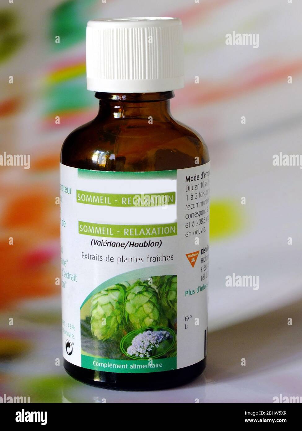 Relaxing with valerian and hops to regain sleep Stock Photo - Alamy