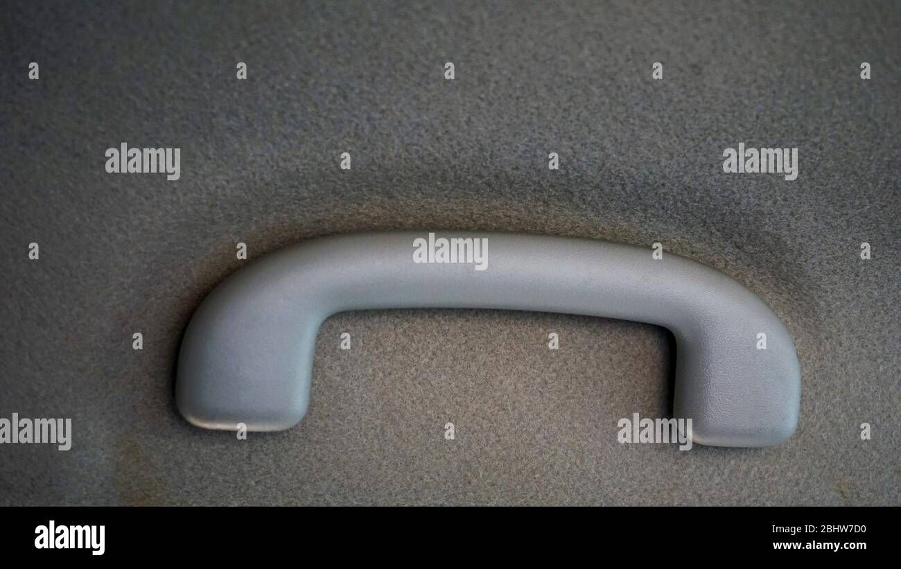 The handle to hold the passenger in the car Stock Photo - Alamy