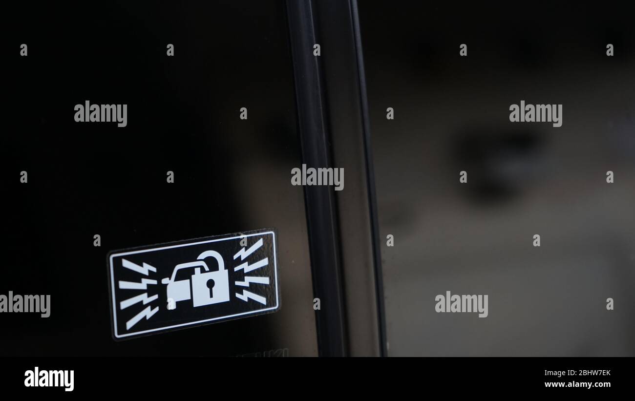 A warning sign is automatically locked, stuck to the car window Stock ...