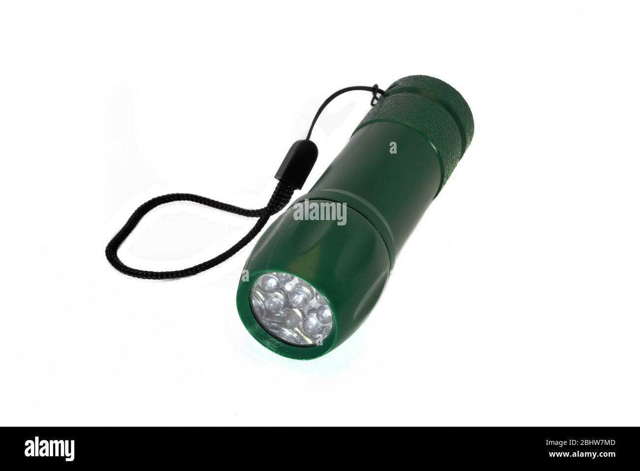 Portable LED flashlight green color isolate on a white background Stock ...