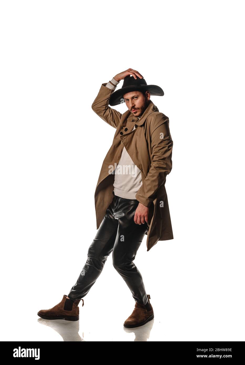 Young detective in black coat Cut Out Stock Images & Pictures - Alamy