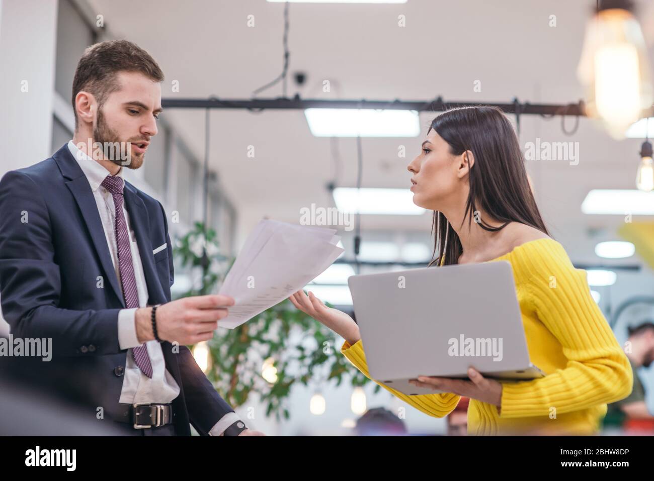 Angry executive director (businessman) throwing paperwork, documents ...