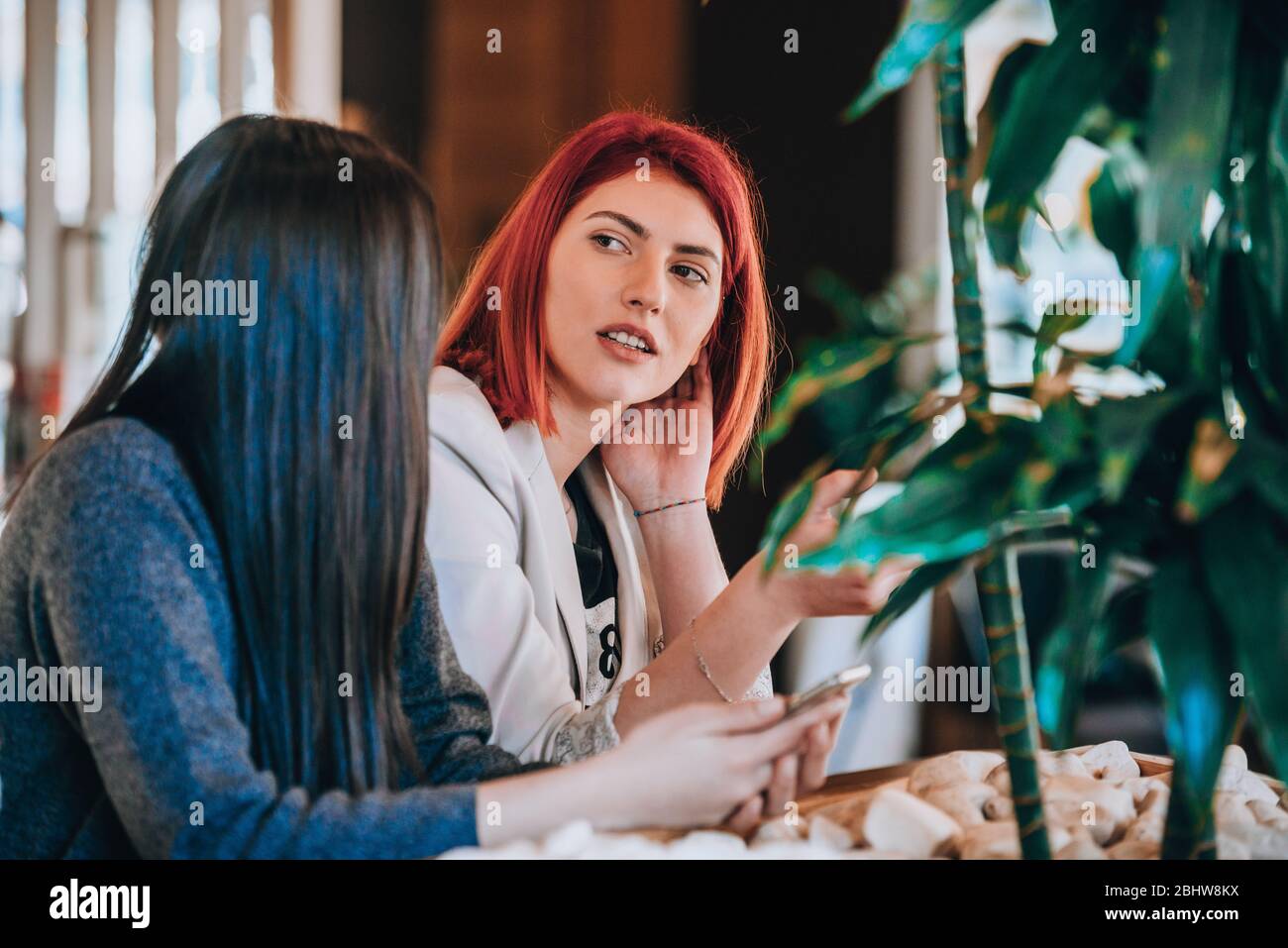 Diverse friends hanging out cafe hi-res stock photography and images ...
