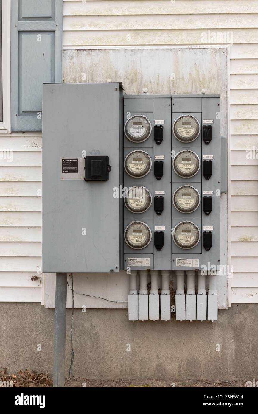 Newport News, VA/USA-March 16, 2020: Electrical meters on the side of ...