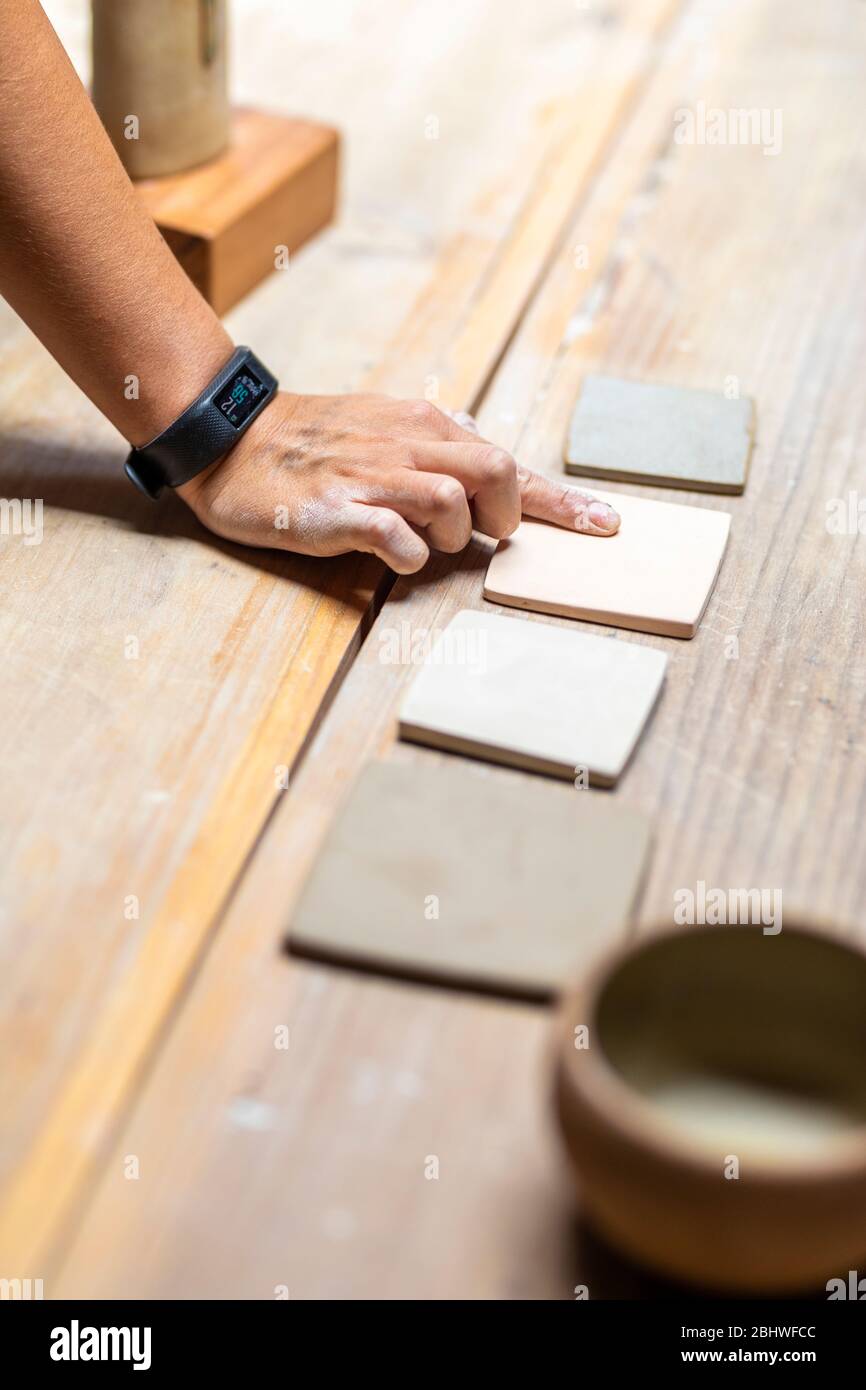 A selection of different materials for handcraft pottery with the hand ...