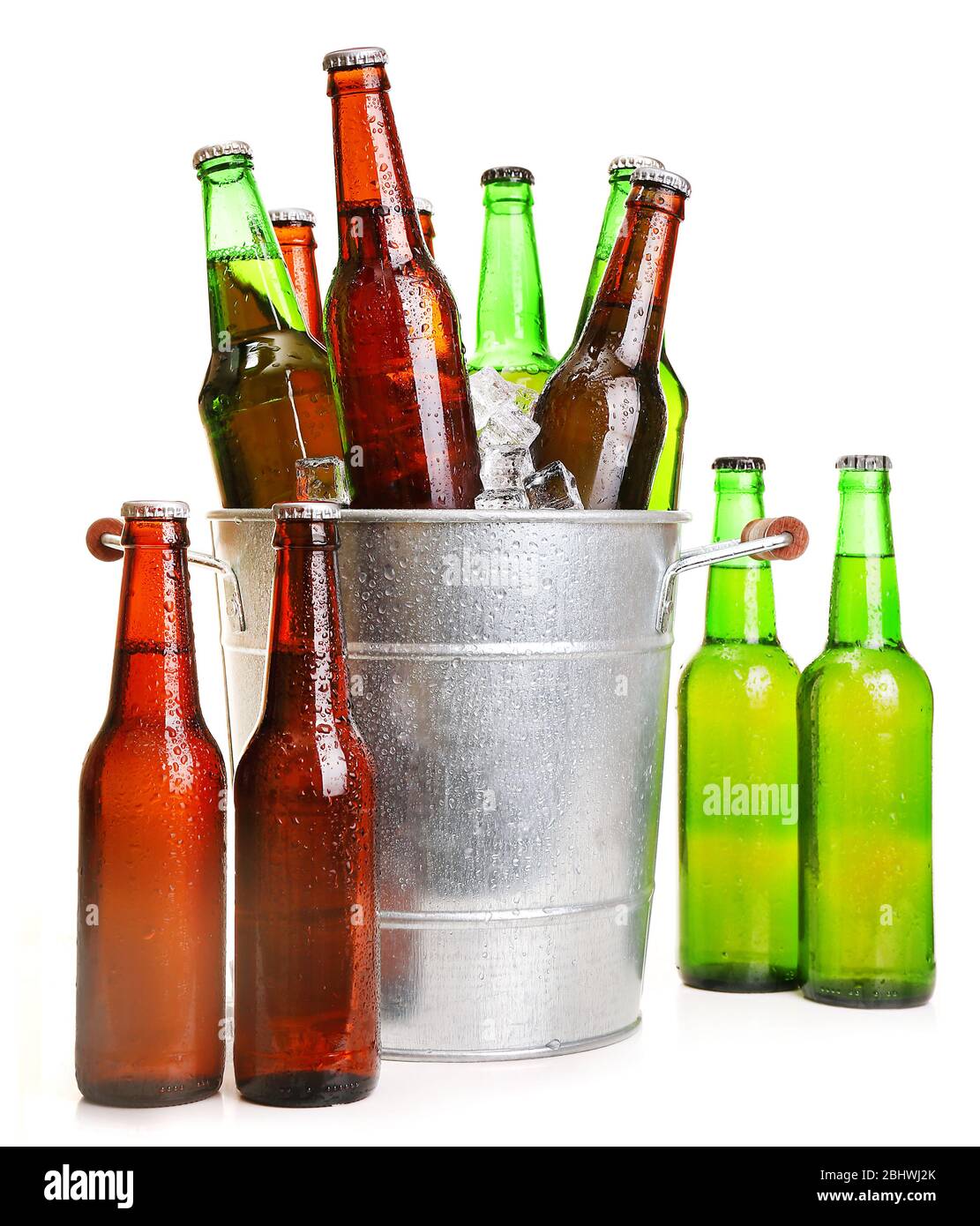 Glass bottles of beer in metal bucket isolated on white Stock Photo - Alamy