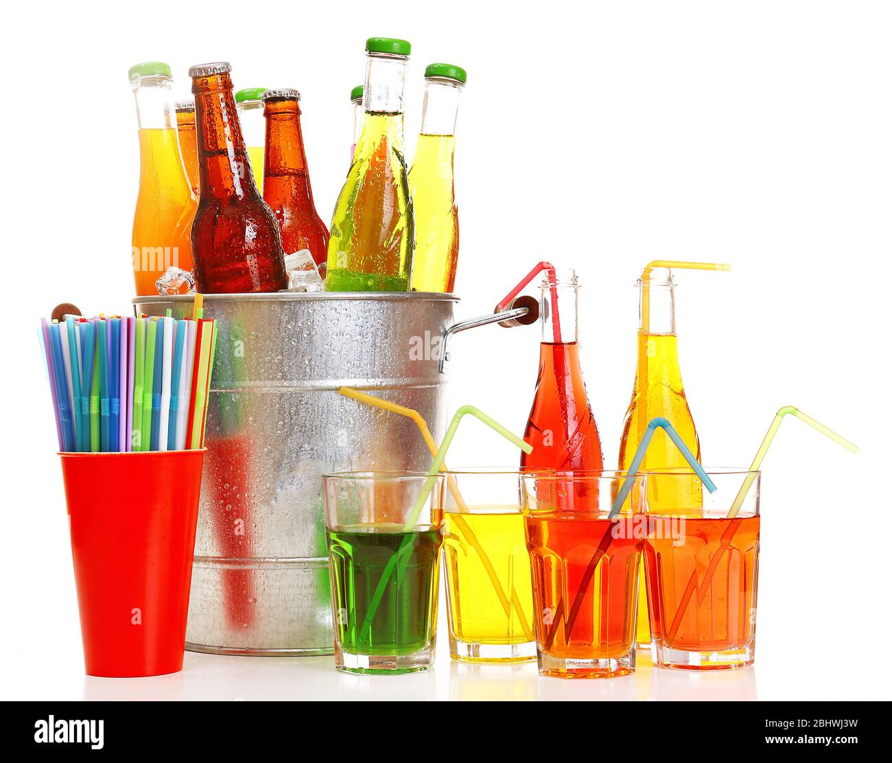 Glassware of different drinks in metal bucket isolated on white Stock ...
