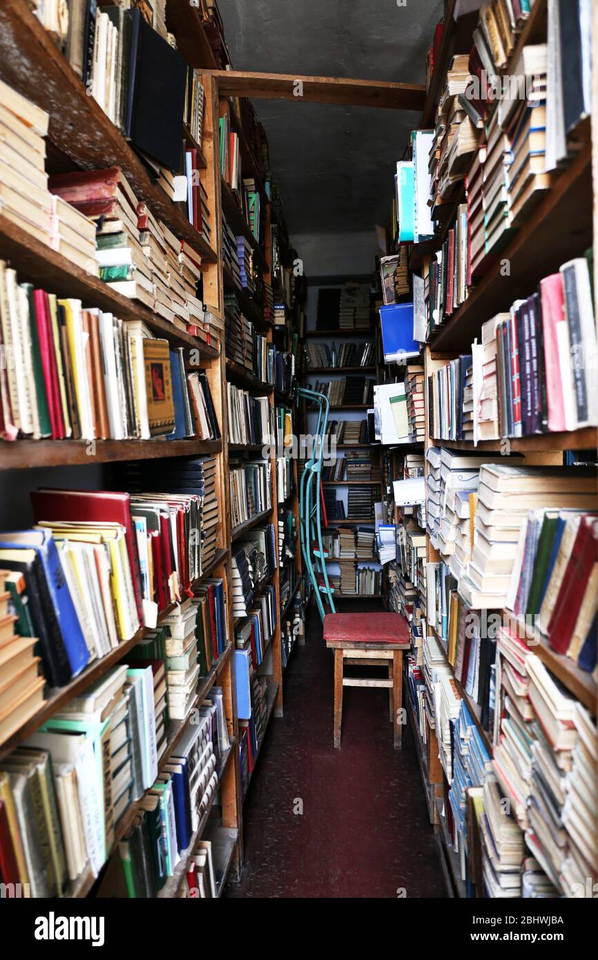 Many books on bookshelf in library Stock Photo - Alamy