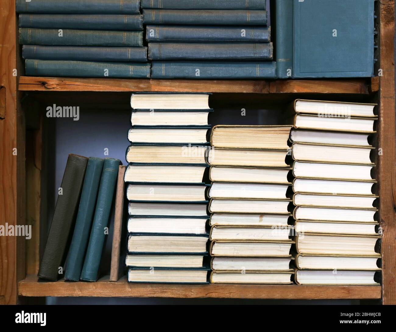 Many books on bookshelf in library Stock Photo - Alamy