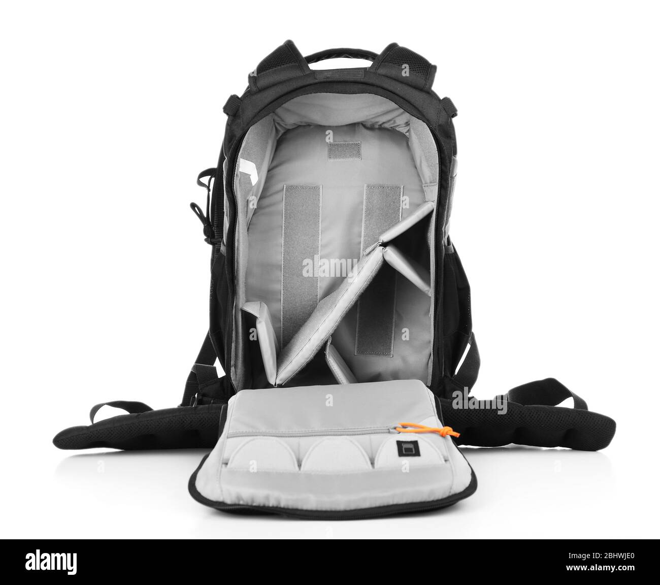 Open backpack of photographer isolated on white Stock Photo - Alamy