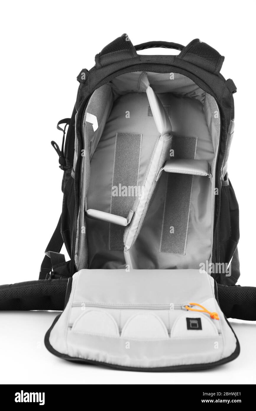 Open backpack of photographer isolated on white Stock Photo - Alamy
