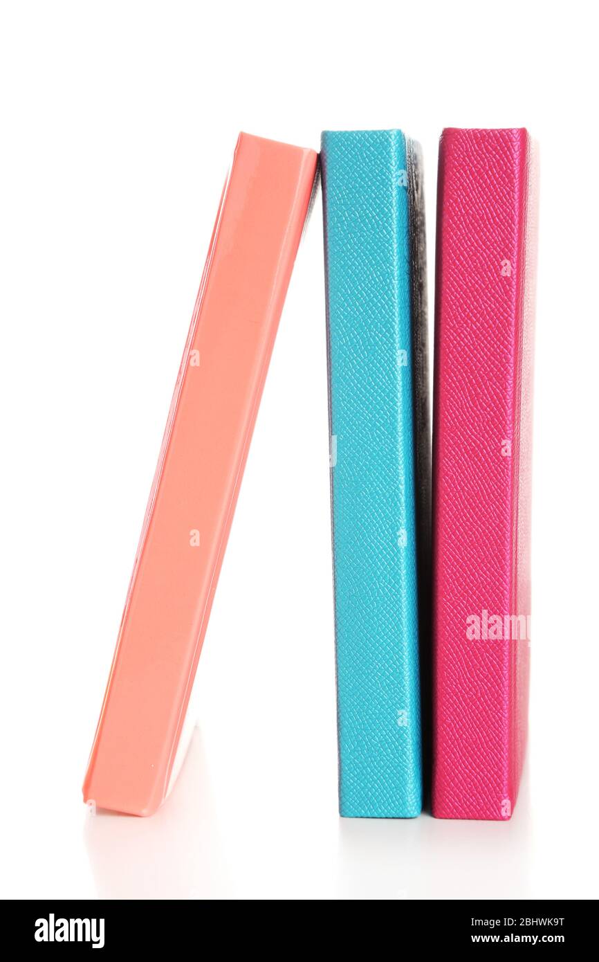 Colorful notebooks, isolated on white Stock Photo - Alamy
