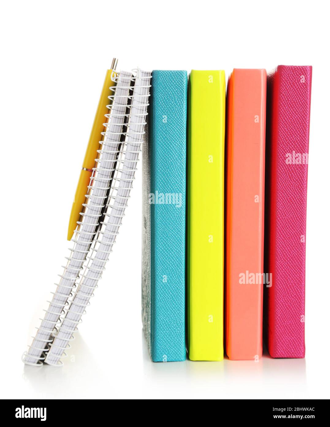 Colorful notebooks and pen, isolated on white Stock Photo - Alamy