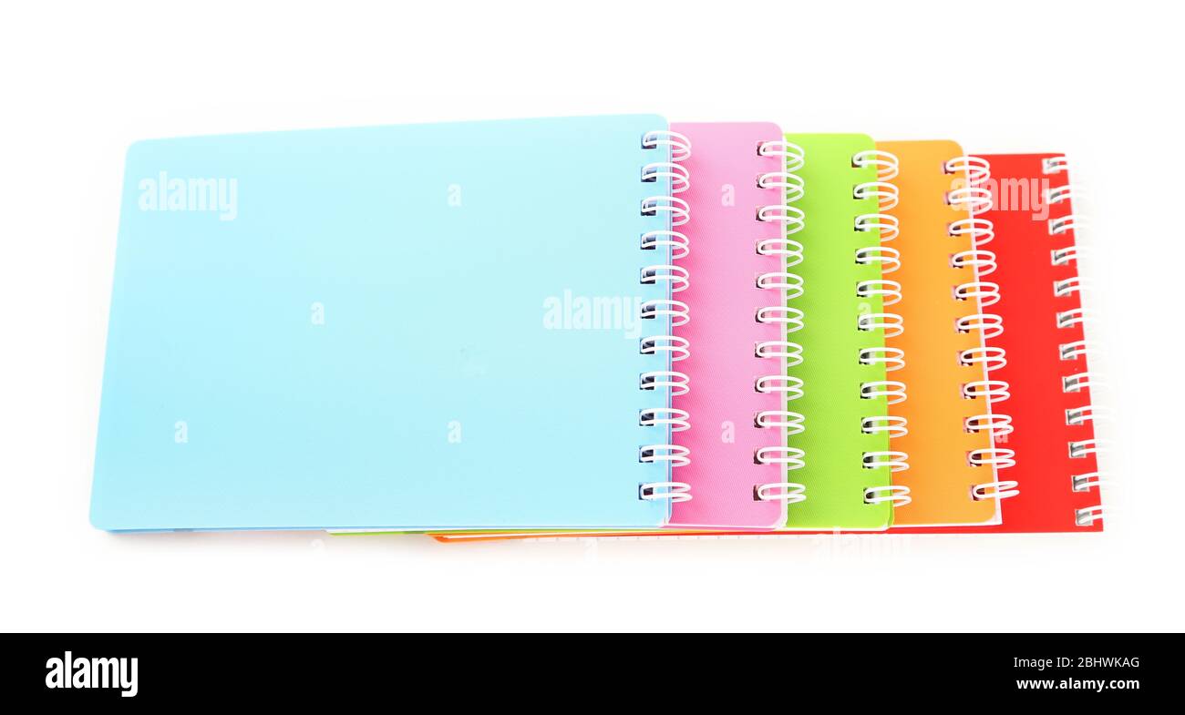 Colorful notebooks, isolated on white Stock Photo - Alamy