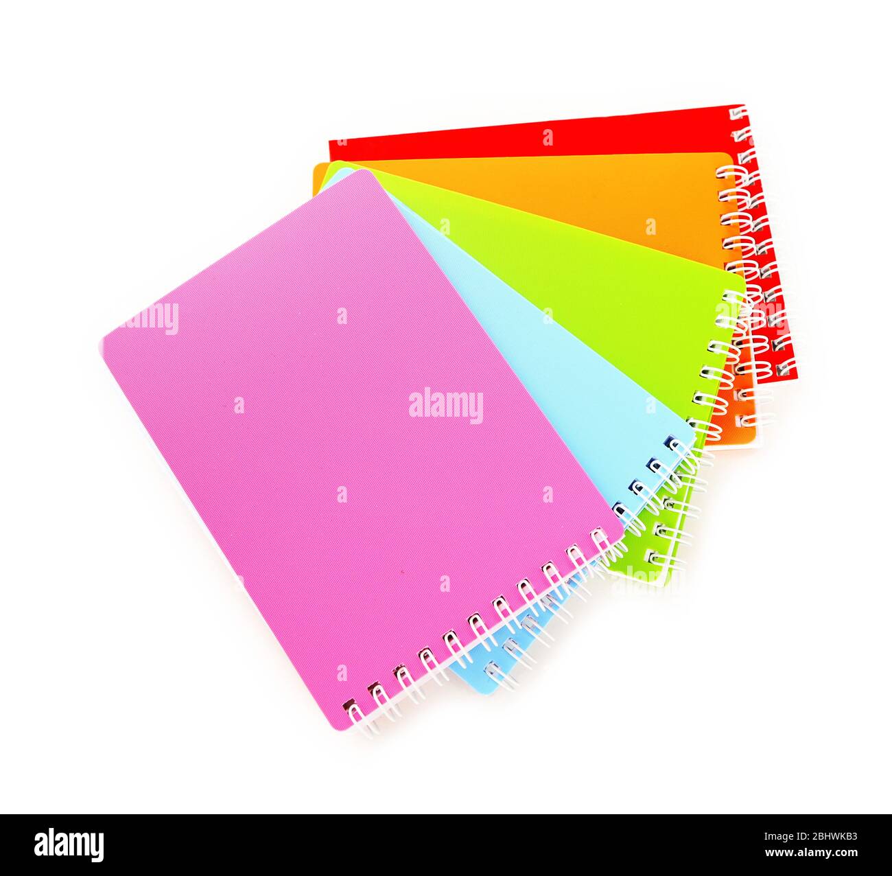 Colorful notebooks, isolated on white Stock Photo - Alamy