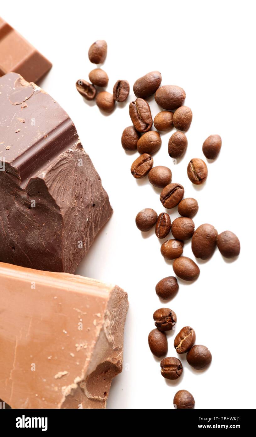 Chocolate bars with coffee beans isolated on white Stock Photo - Alamy