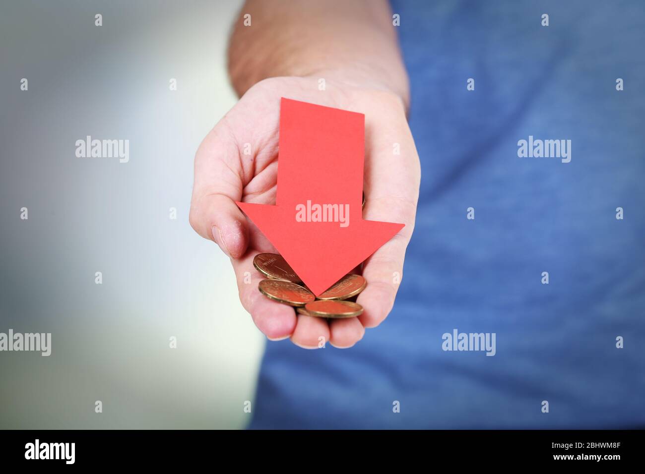 Hand holding pennies hi-res stock photography and images - Alamy
