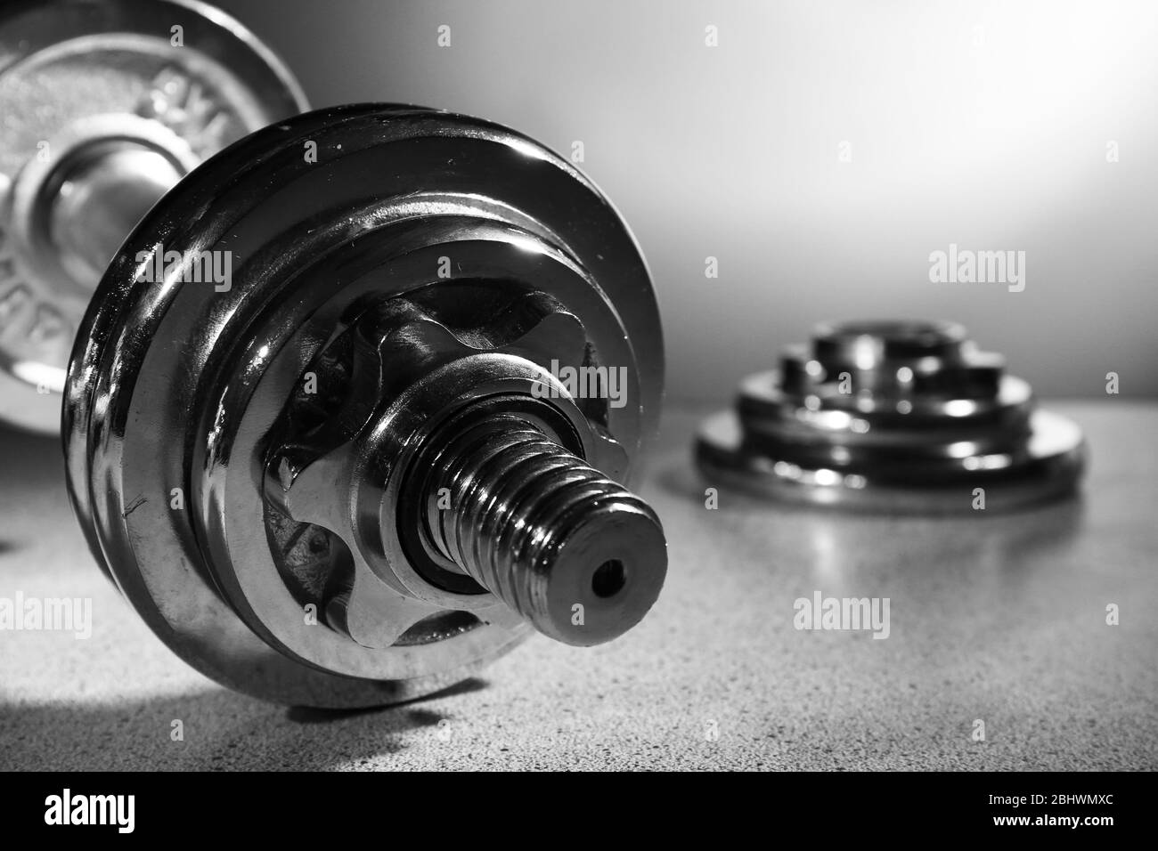Silver dumbbell Black and White Stock Photos & Images - Alamy
