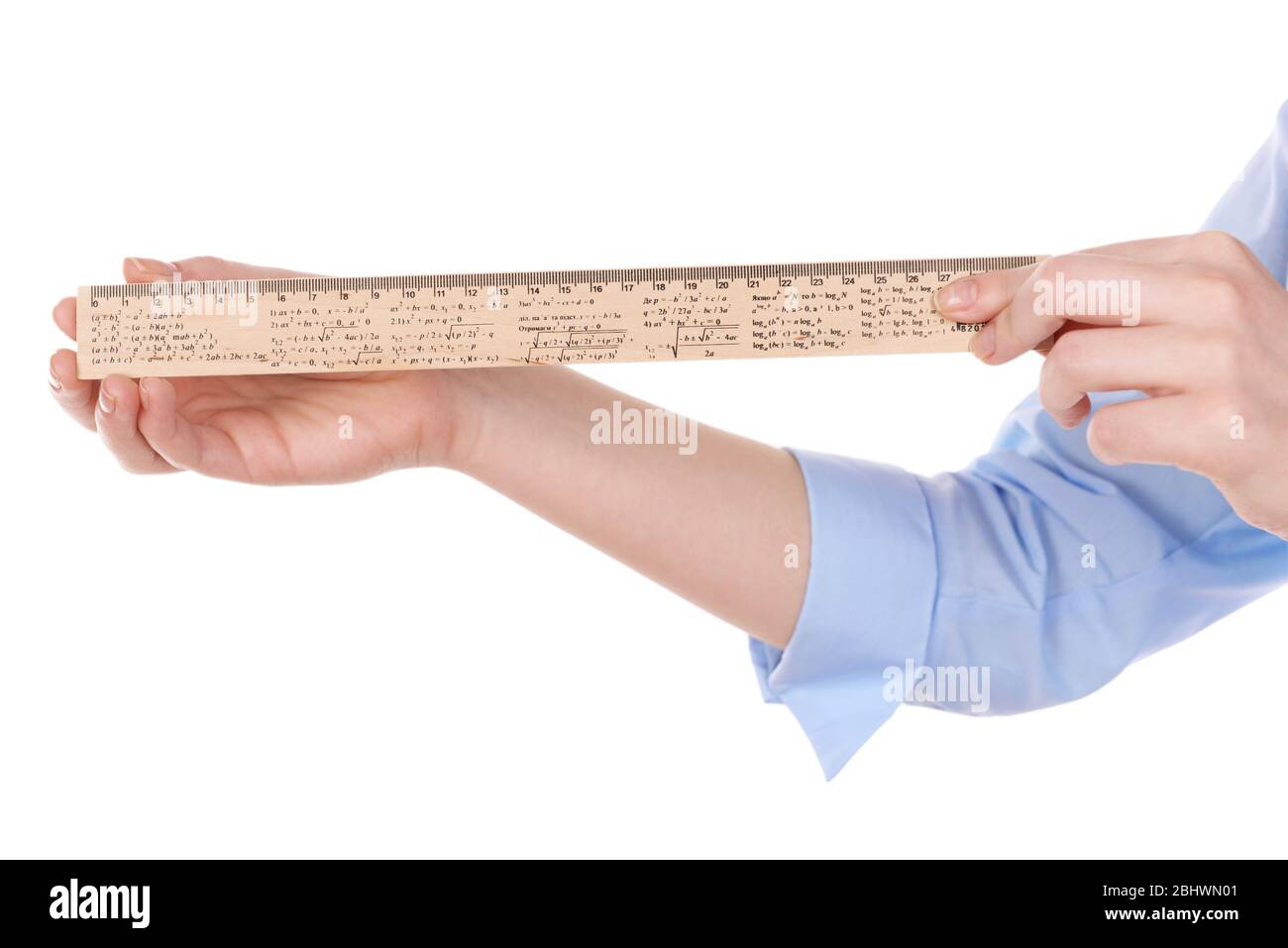 Female hands with wooden ruler isolated on white Stock Photo - Alamy