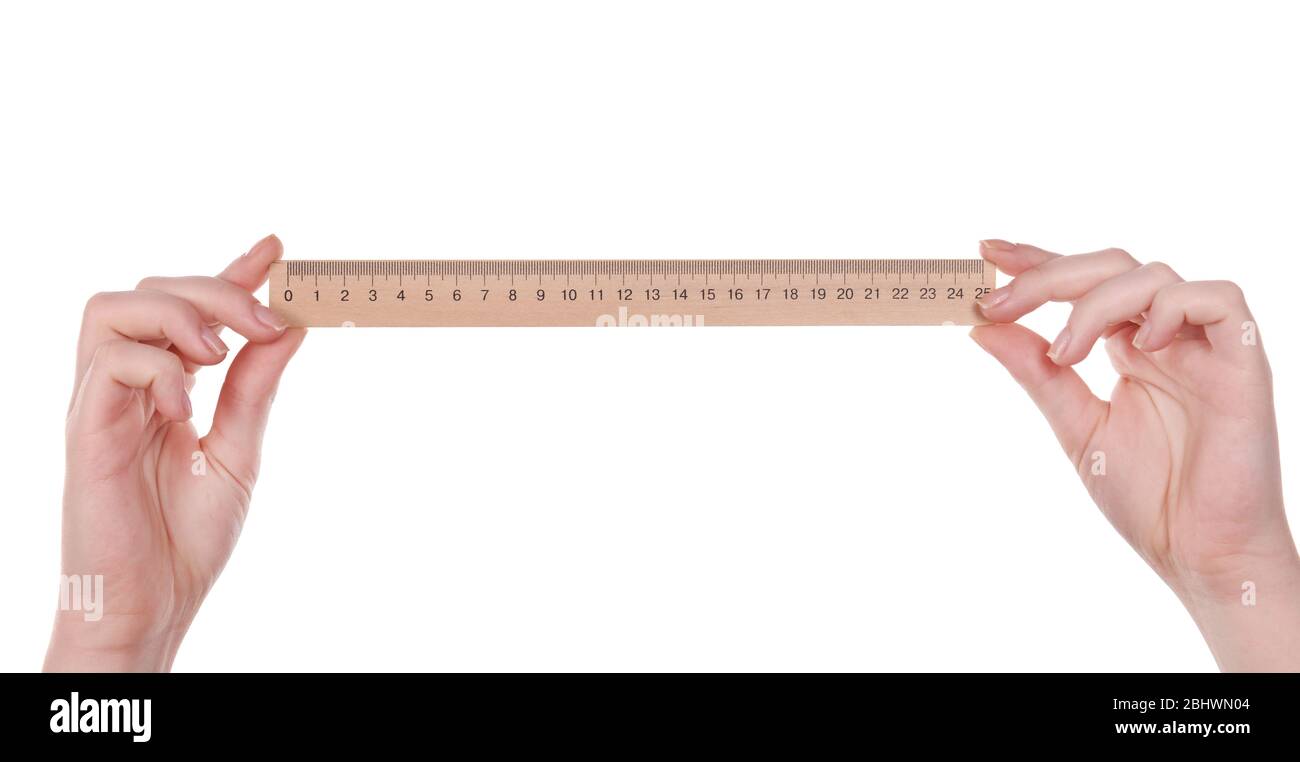Female hands with wooden ruler isolated on white Stock Photo - Alamy