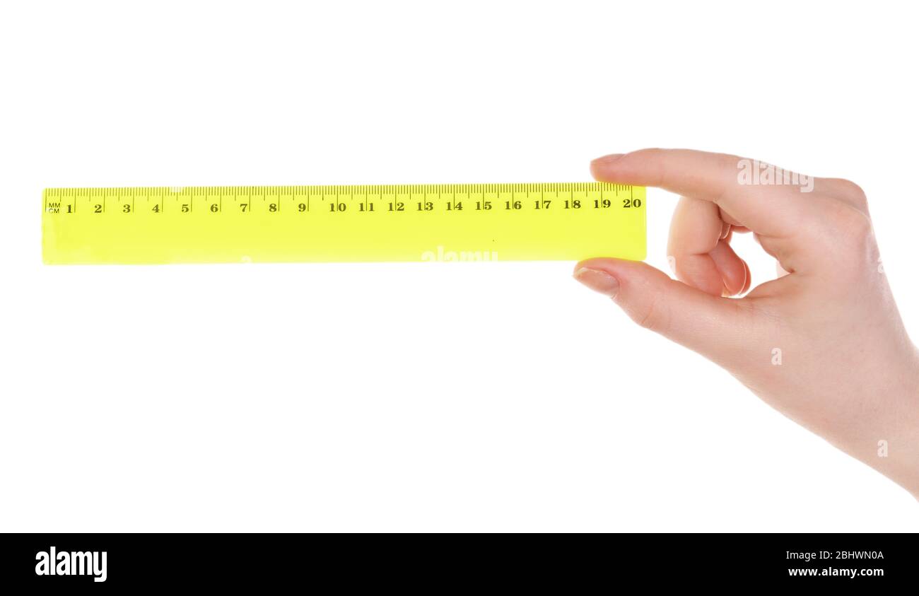 Female hand with plastic ruler isolated on white Stock Photo - Alamy