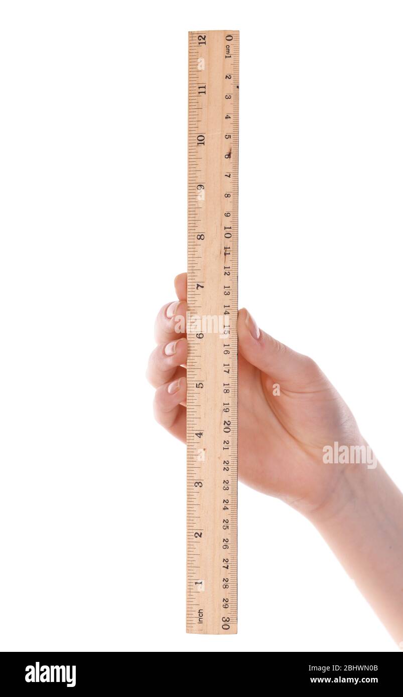 Female hand with wooden ruler isolated on white Stock Photo - Alamy