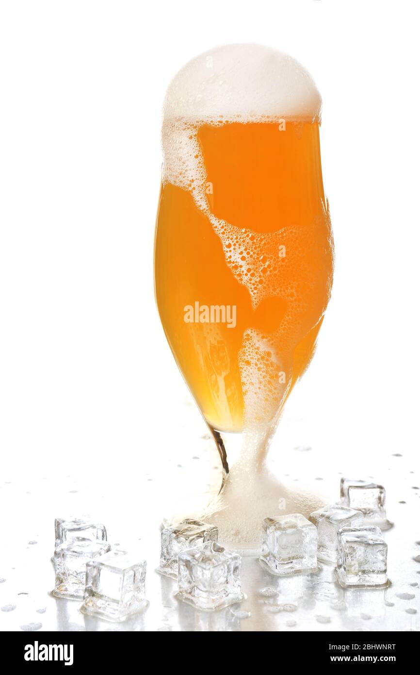 Glass of beer with foam and ice cubes isolated on white Stock Photo - Alamy