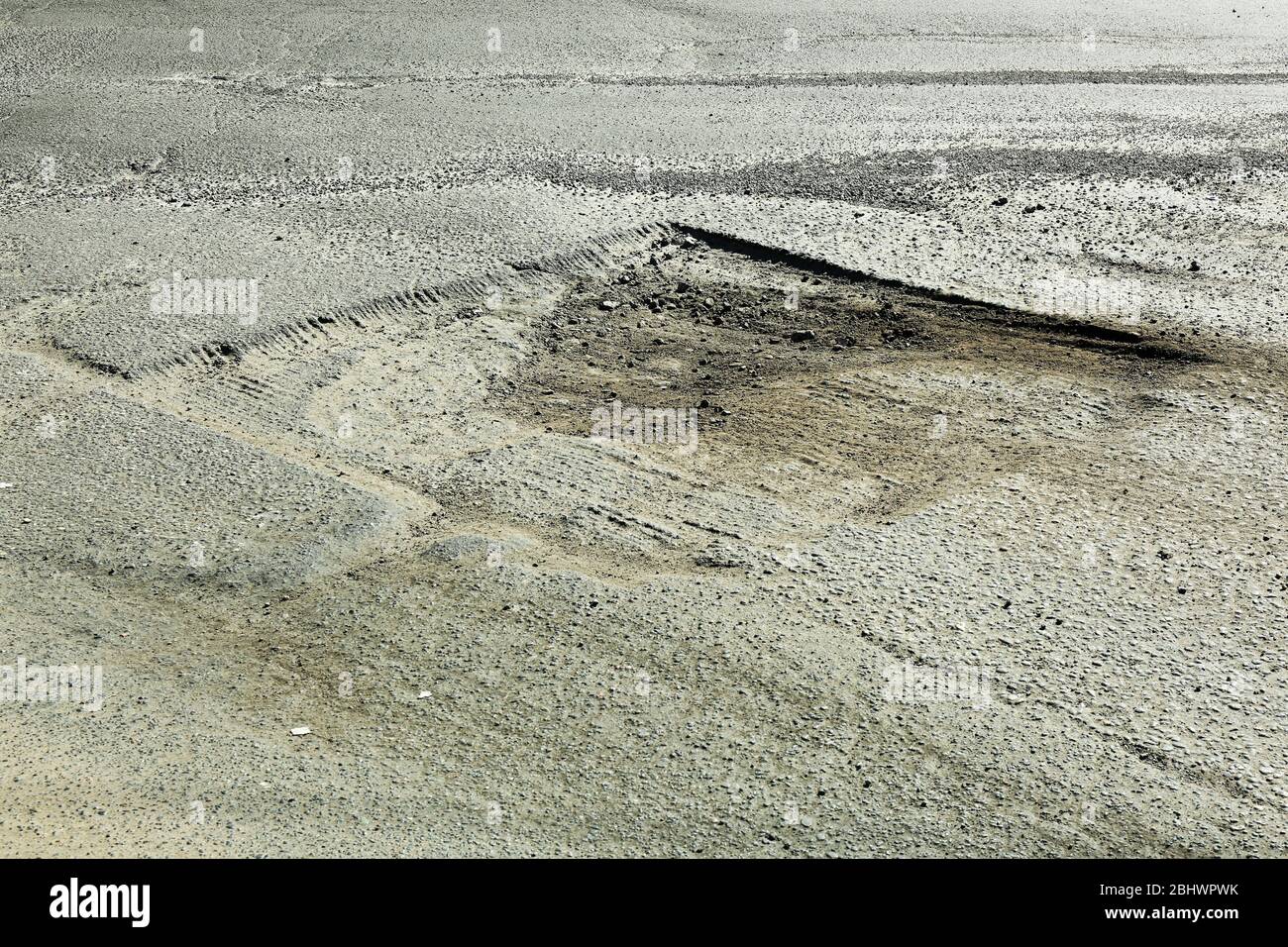 Very bad quality road with potholes Stock Photo - Alamy