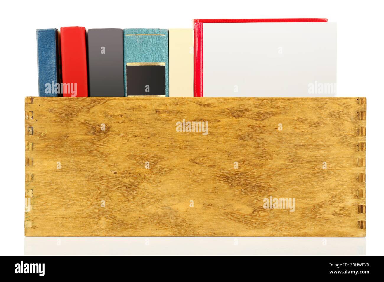 Books in wooden box, closeup Stock Photo - Alamy
